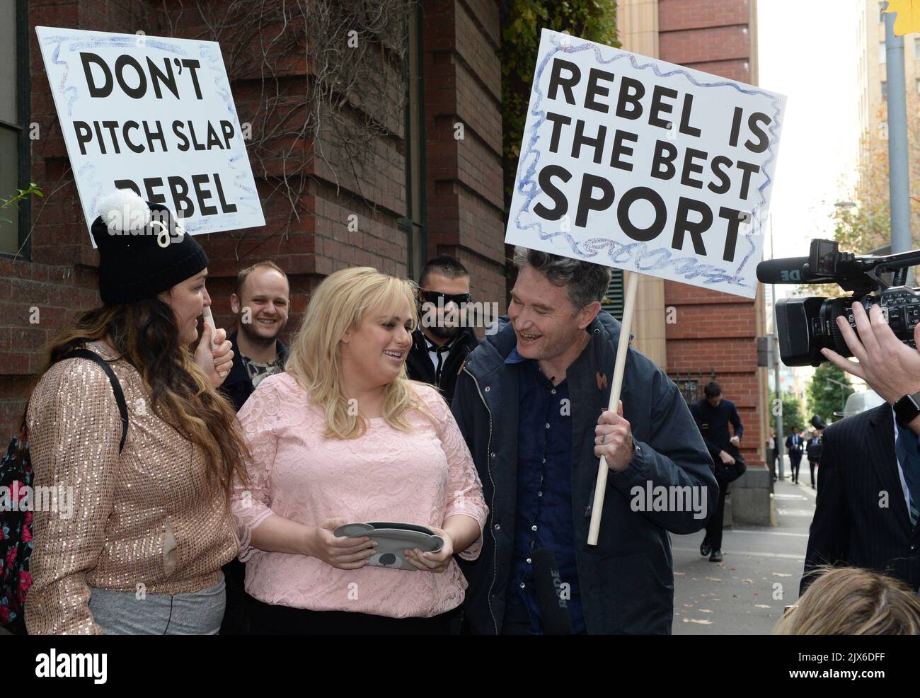 Actor Rebel Wilson is greeted by radio personalities Dave Hughes, Kate ...