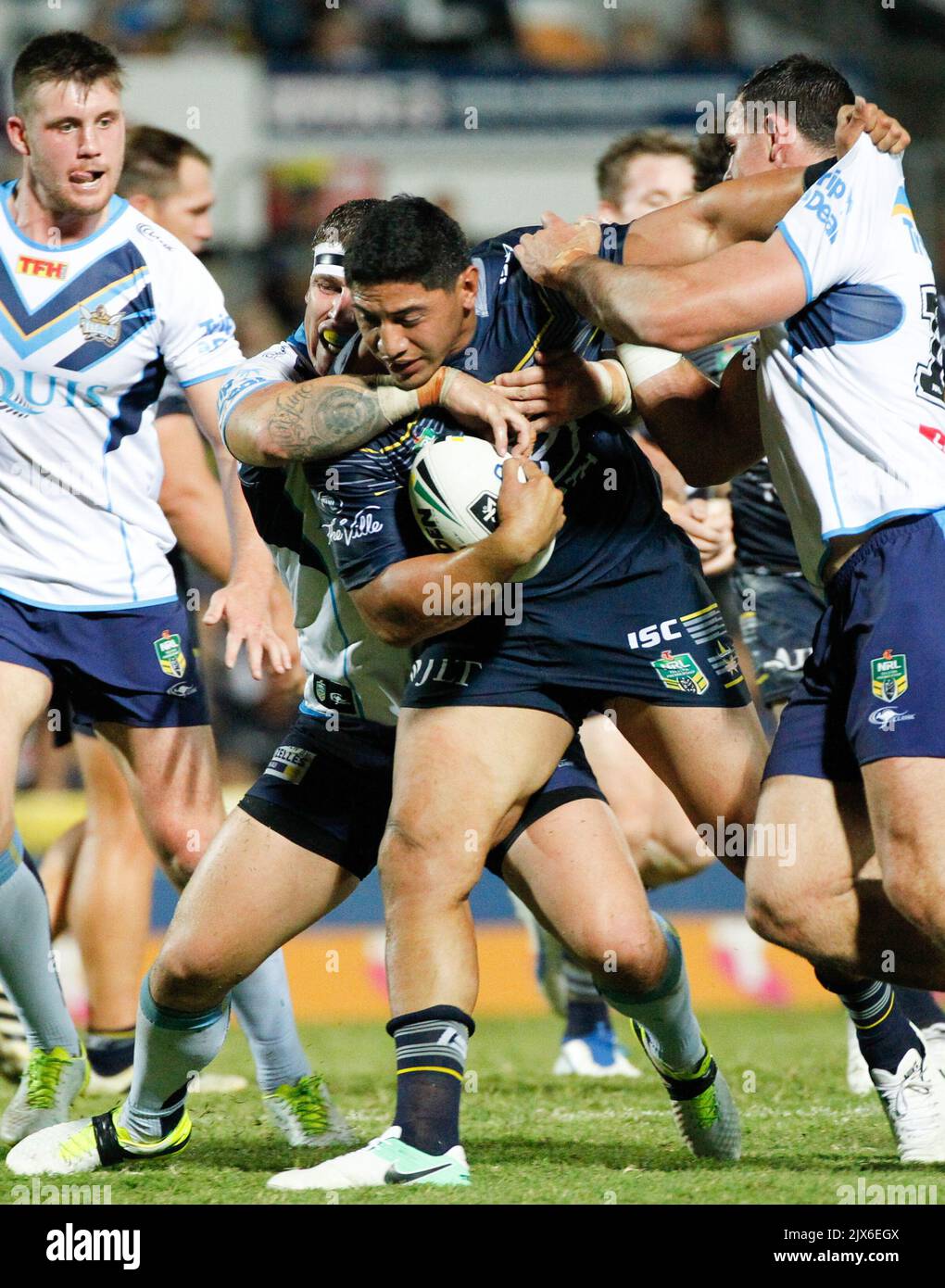 Cowboys Jason Taumalolo tackled by Titans defence during the Round 13 ...