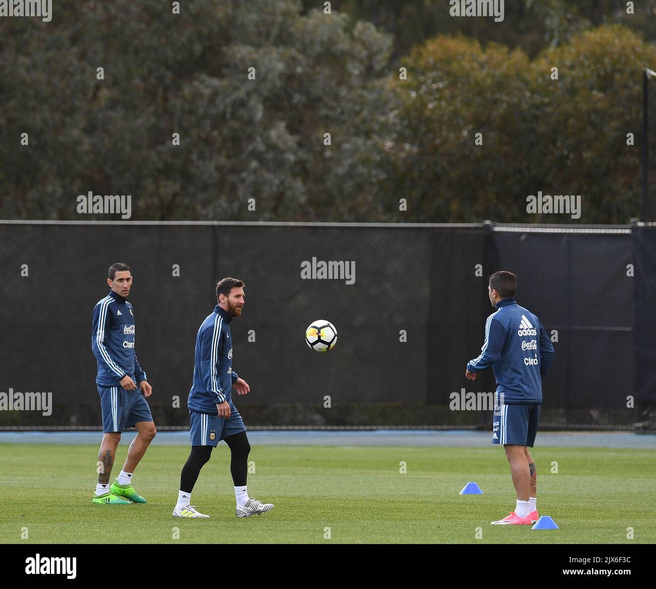 (L-R) Angel di Maria, Lionel Messi and Ever Banega train at La Trobe ...