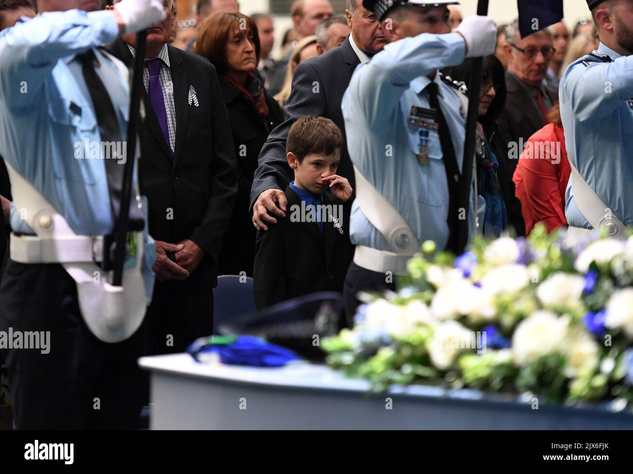 Senior Constable Brett Forte's son Brodie watches a guard of honour for ...
