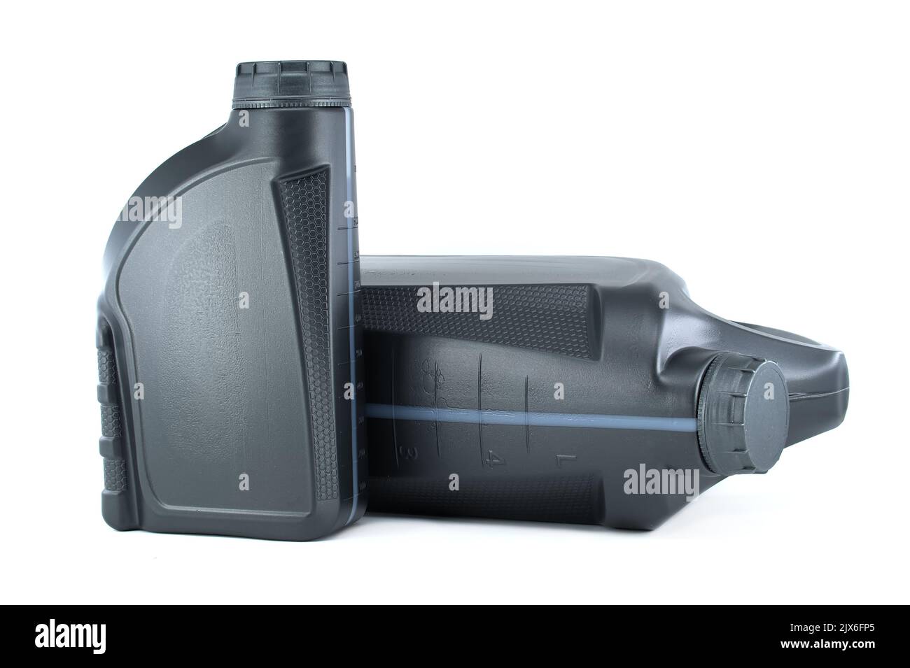 Motor oil containers over a white background. Plastic storage and ...