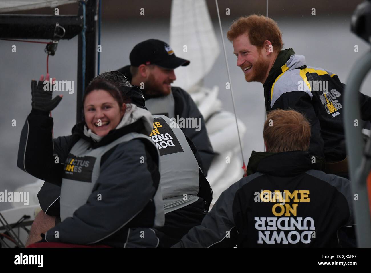 His Royal Highness Prince Harry chats with sailors during a sailing ...