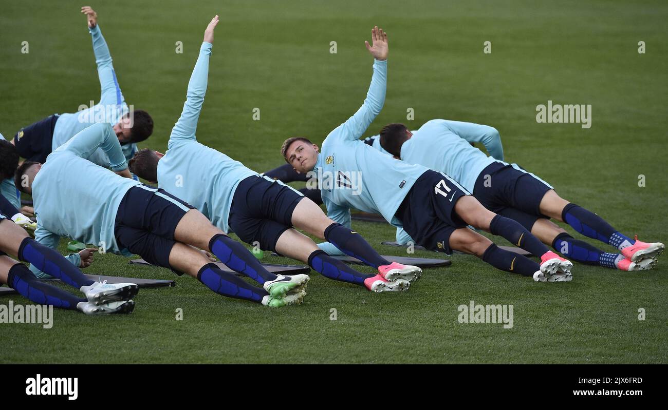 Socceroos player Ajdin Hrustic (second right) is seen during a training ...