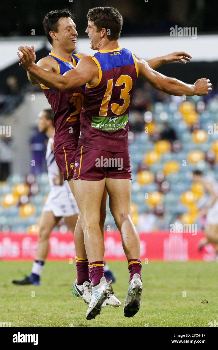 Hugh McCluggage(left) of the Lions and Jarrod Berry(right) of the Lions ...