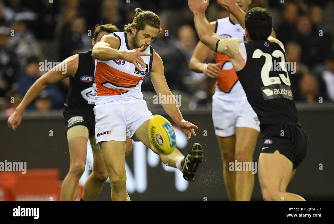 Callan Ward of the Giants (left) is seen in action during the Round 12 ...