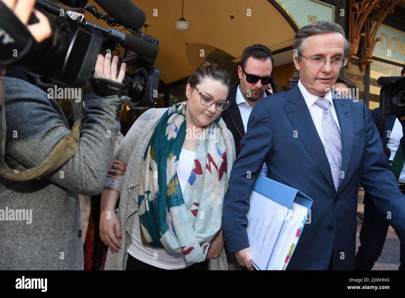 Lauren Cranston (centre), the daughter of Australian Tax Office Deputy ...