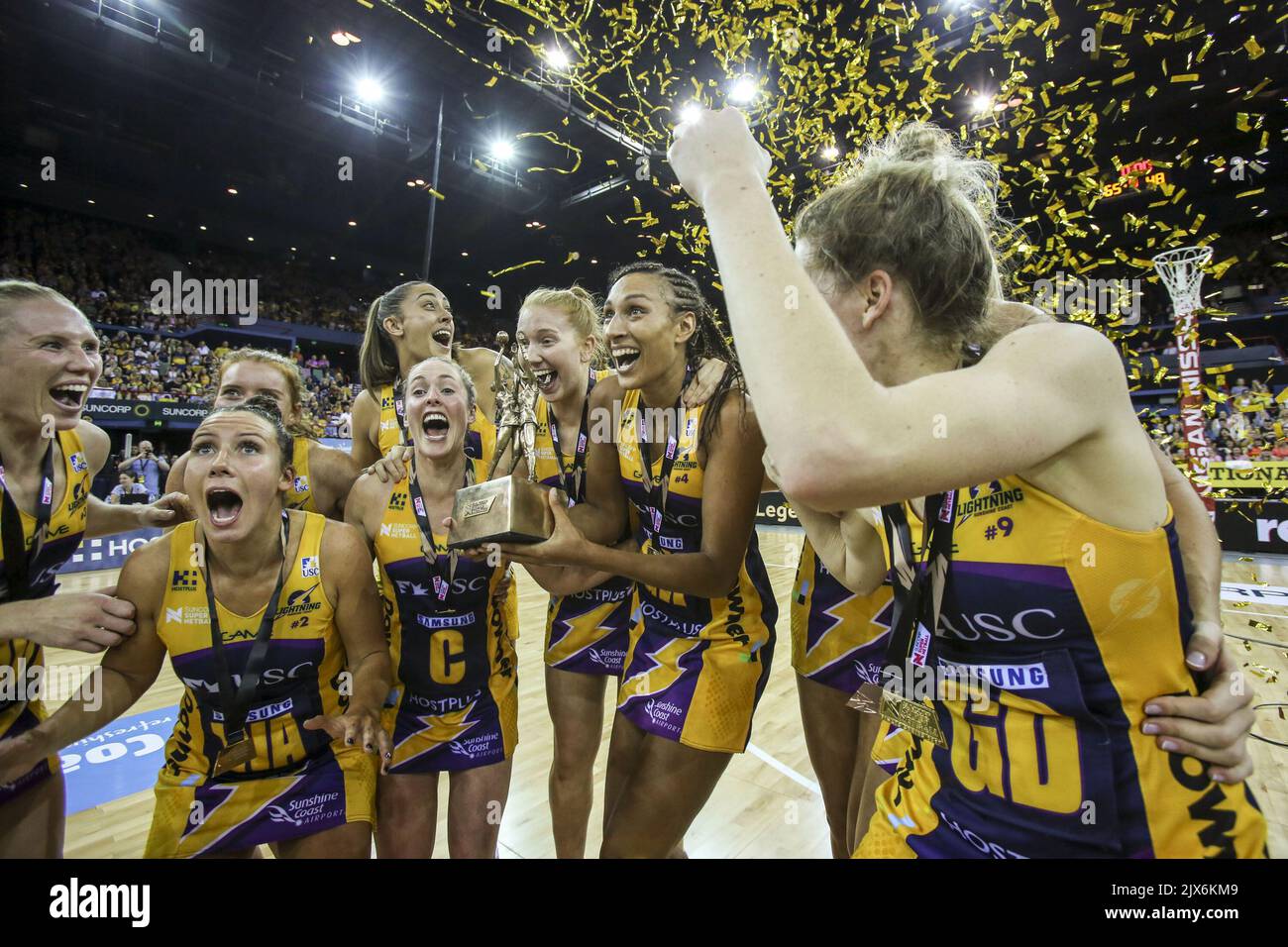 Lightning players celebrate their win in the Suncorp Super Netball ...