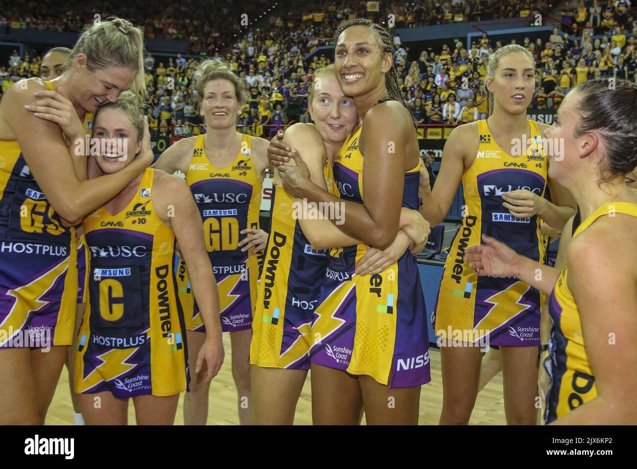 Lightning players celebrate their win in the Suncorp Super Netball ...