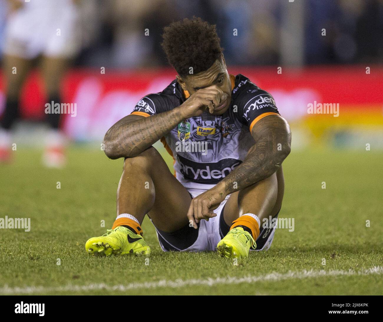 A dejected Kevin Naiqama of the Tigers after the Round 15 NRL match ...