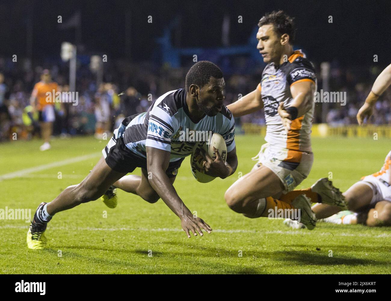 Edrick Lee of the Sharks scores during the Round 15 NRL match between ...