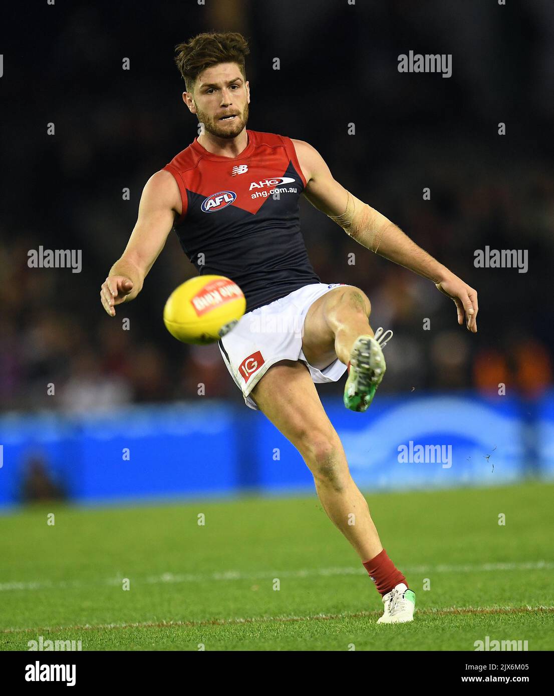Tomas Bugg of the Demons is seen in action during the Round 13 AFL ...