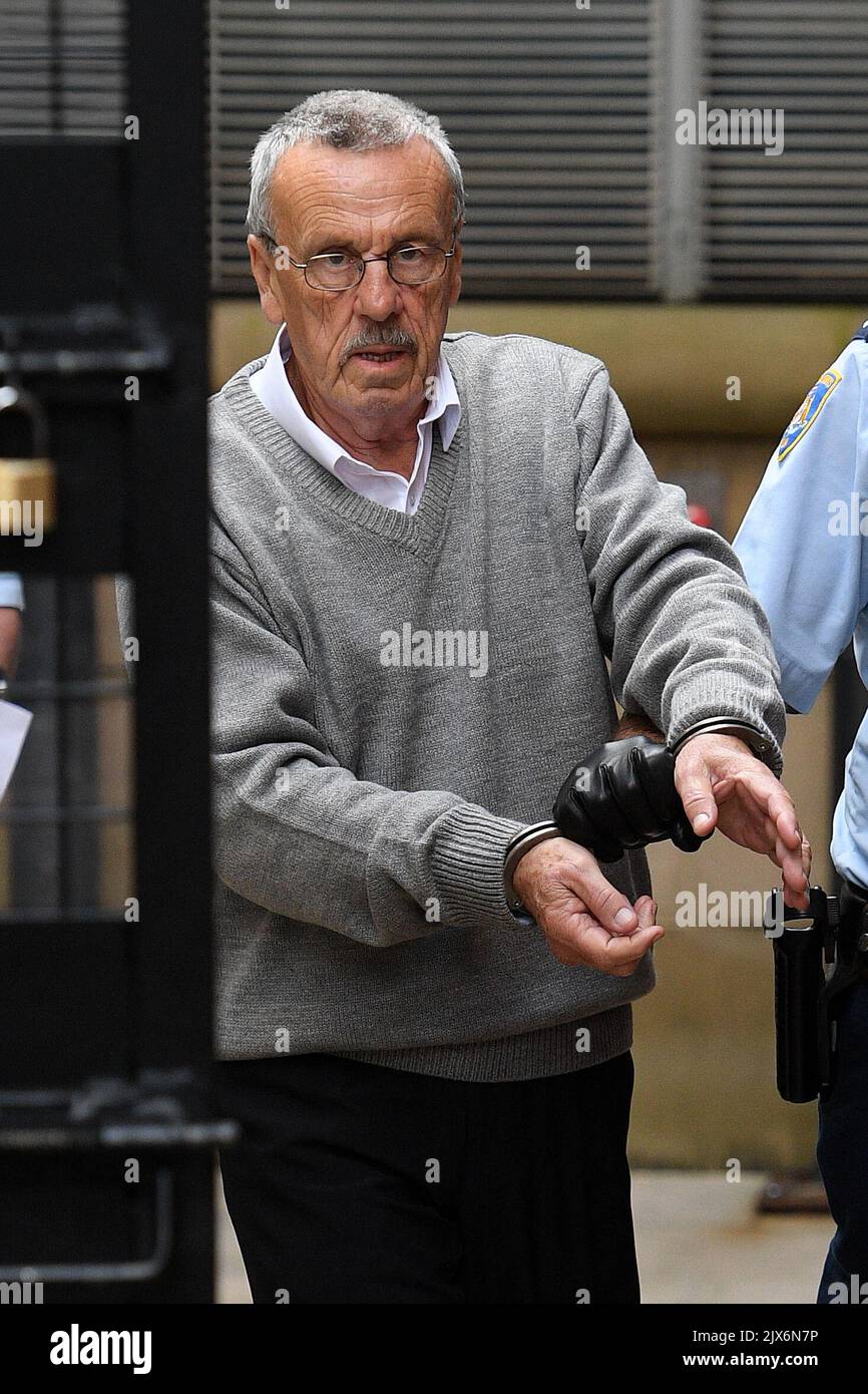 Donald Reeves is escorted by Corrective Services officers to a prison ...