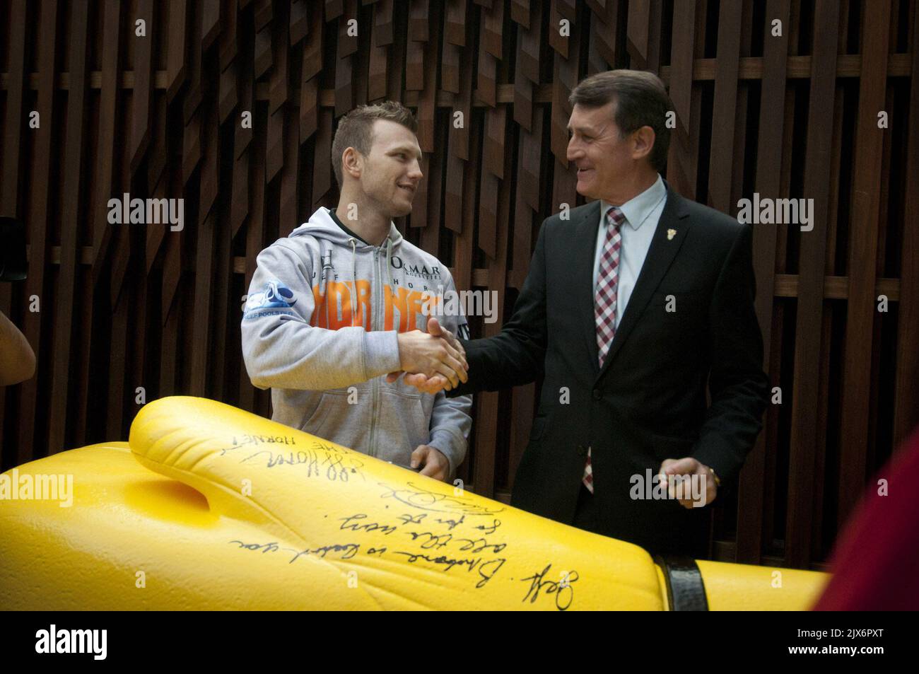 Boxer Jeff Horn (left) with Lord Mayor Graham Quirk during the signing ...