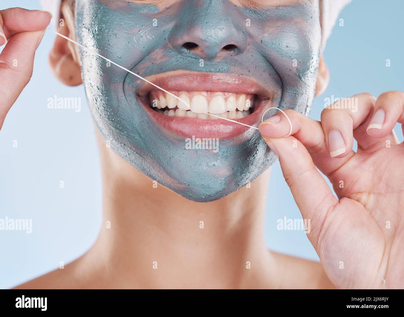 Dental, face mask and woman flossing her teeth for healthy and strong ...