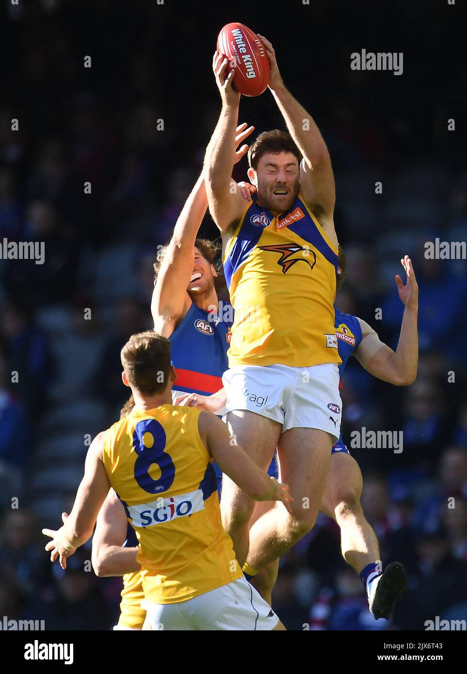 Jeremy McGovern of the Eagles (right) is seen in action during the ...