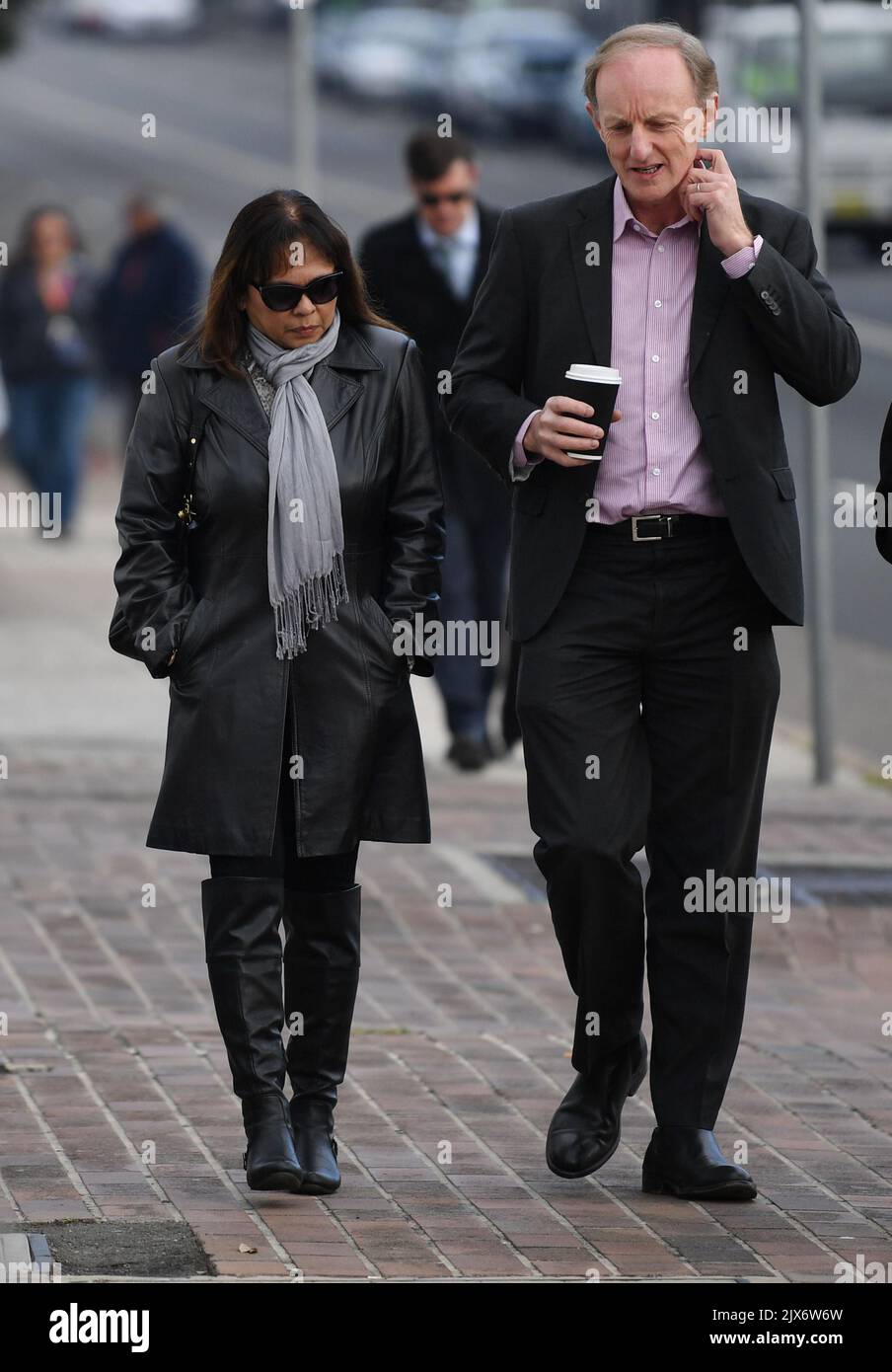 Linda Ellis (left), the fiancee of Steve Jarvie, arrives to attend the ...