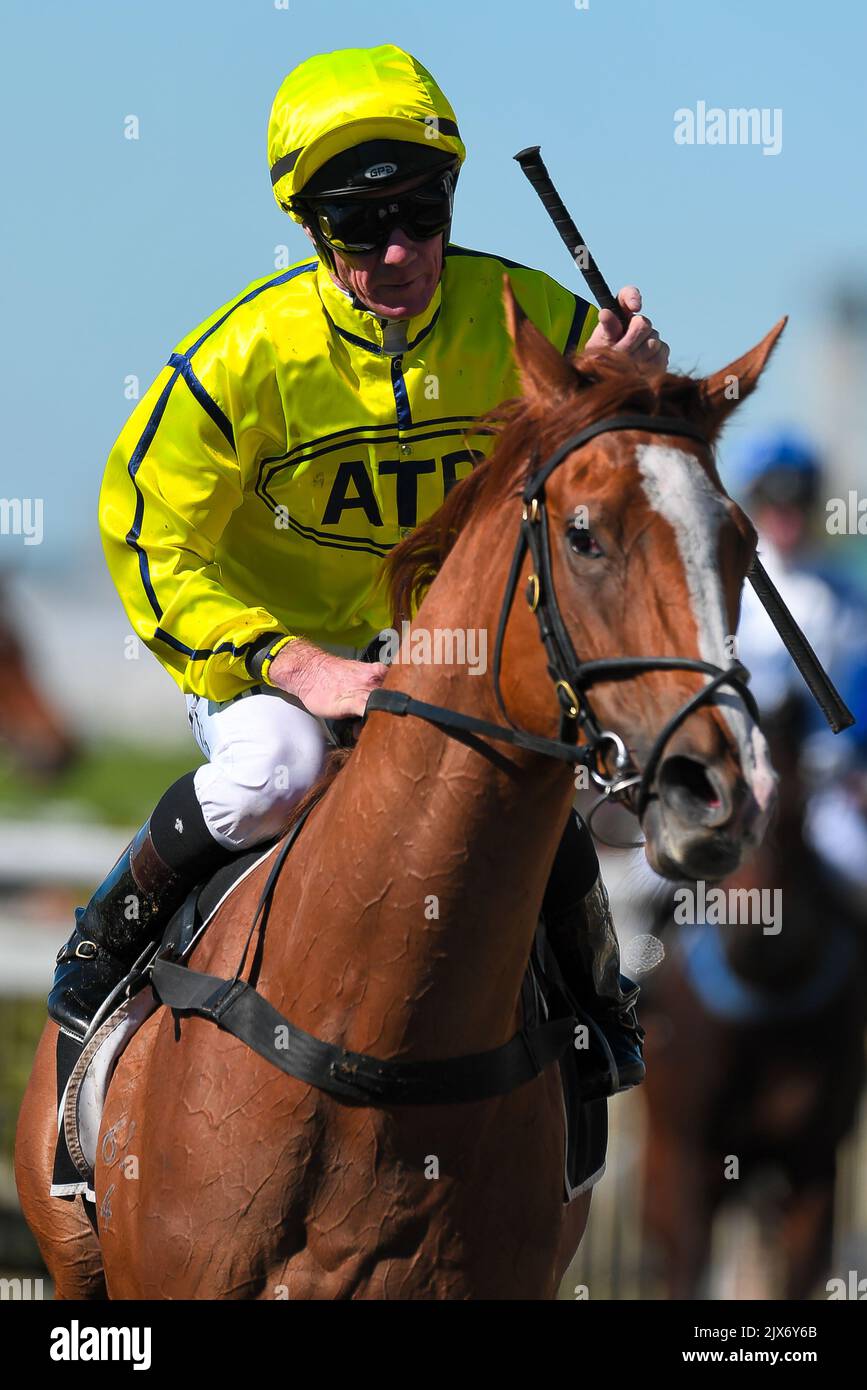 Jockey Jim Byrne makes his way to the scales after riding She's Our ...