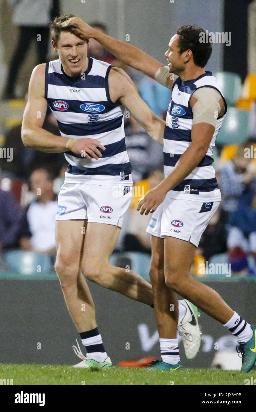 Mark Blicavs(left) of the Cats celebrates a goal during the Round 16 ...