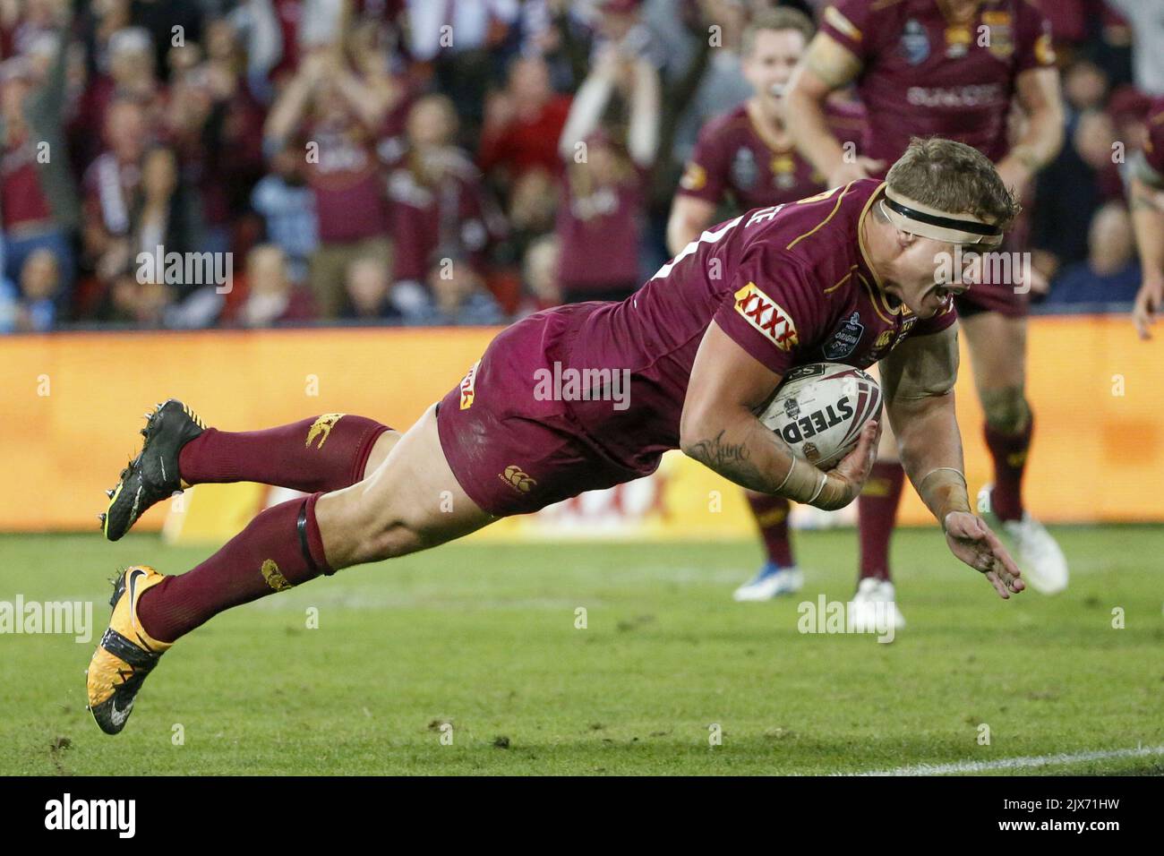 Jarrod Wallace of the Maroons scores a try during State of Origin Game ...
