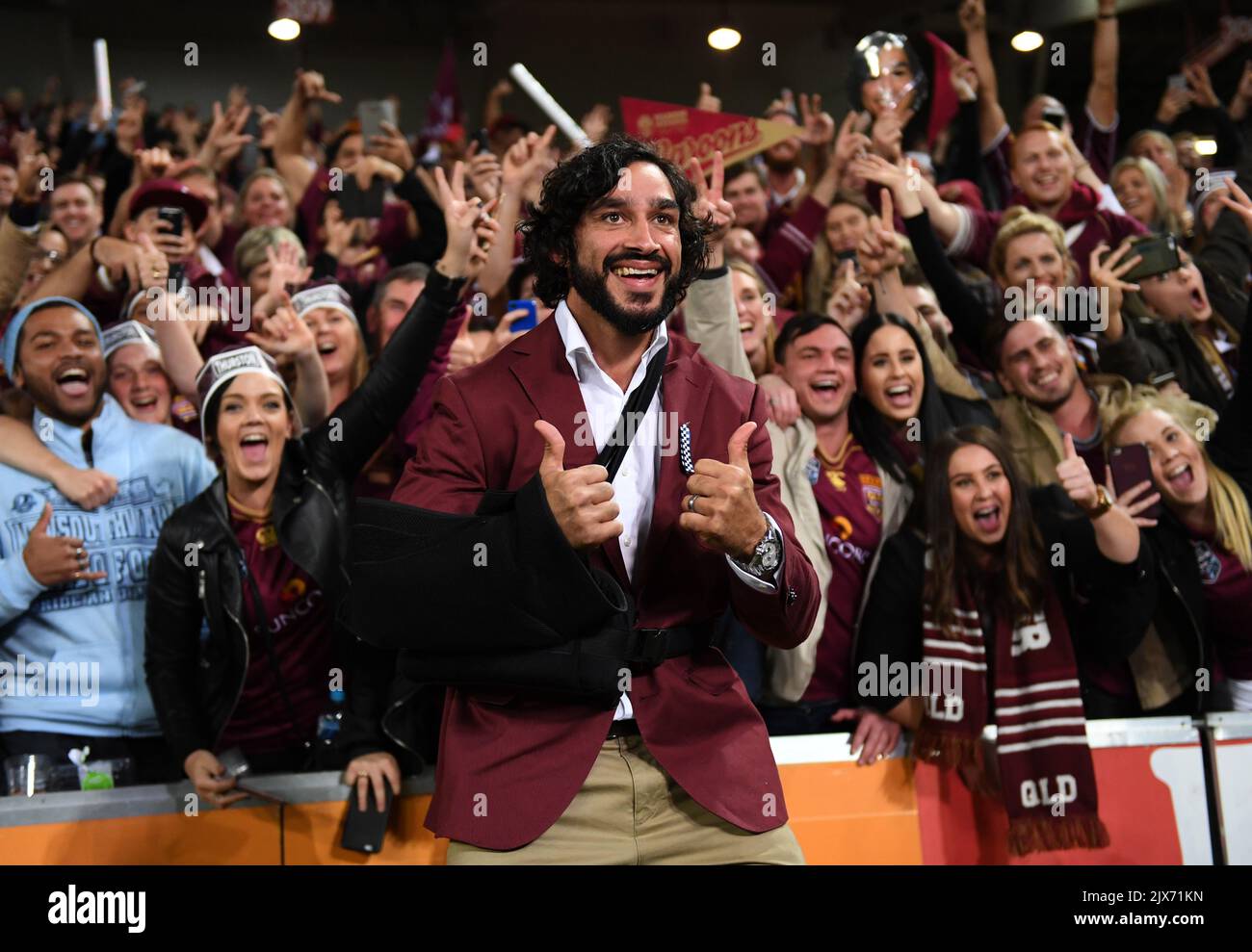 Maroon legend Johnathan Thurston poses for a photo with fans, taken on ...