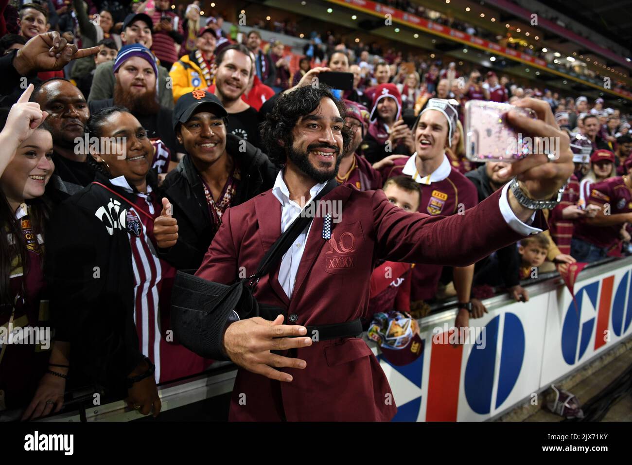Maroon legend Johnathan Thurston poses for a photo with fans after the ...