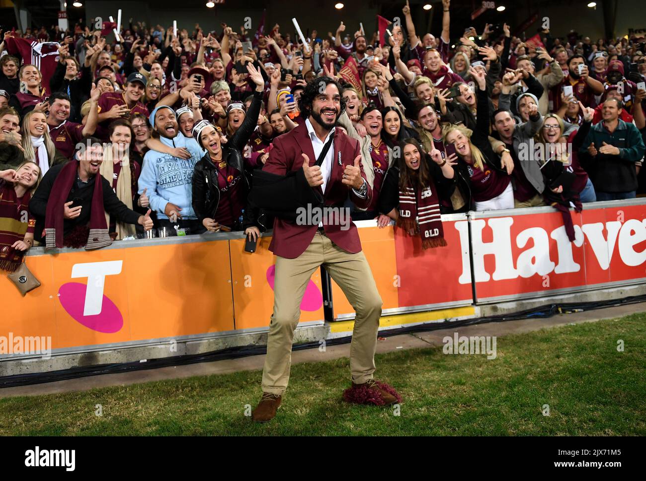 Maroon legend Johnathan Thurston poses for a photo with fans, taken on ...