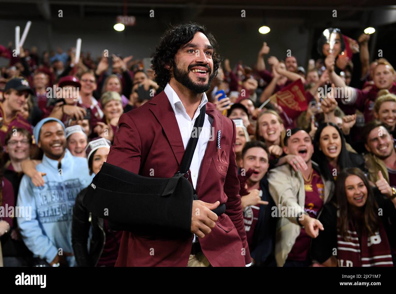 Maroon legend Johnathan Thurston poses for a photo with fans, taken on ...