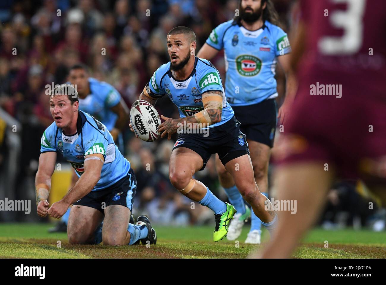 Nathan Peats of the NSW Blues (centre) in action during State of Origin ...