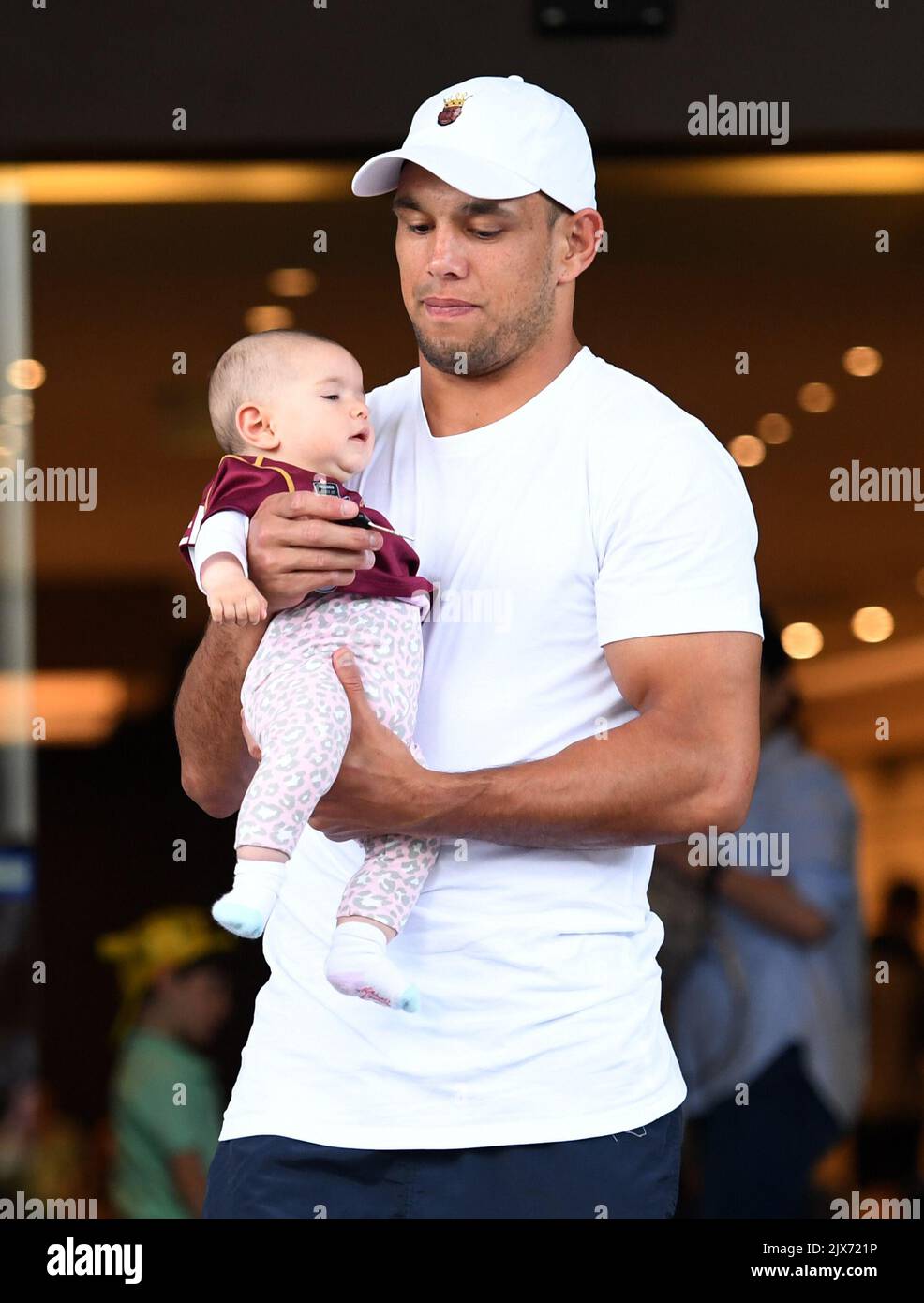Queensland Maroons player Will Chambers and his child leave the team's ...