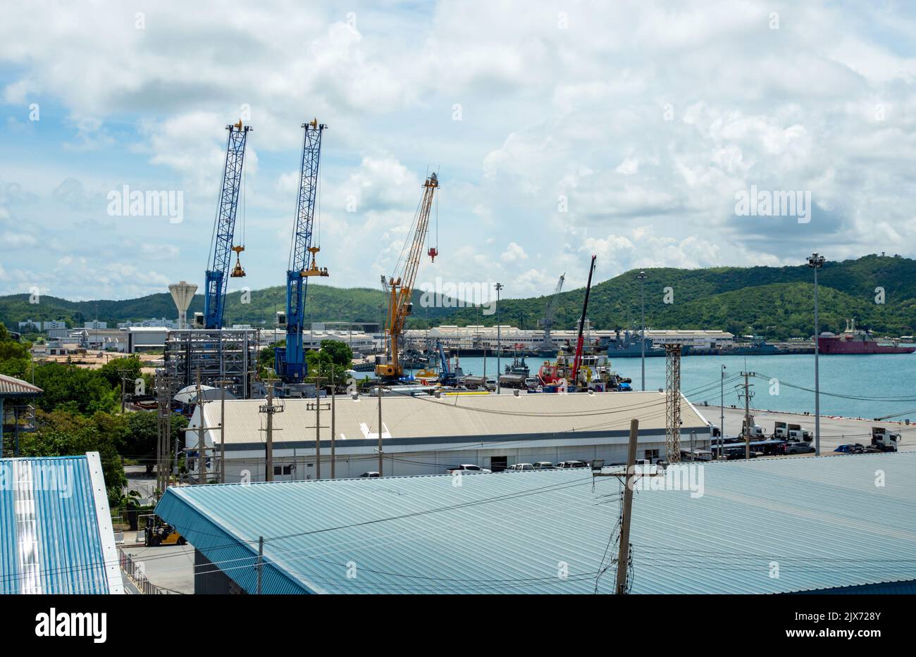 Industrial port crane lift up loading export containers box onboard at ...