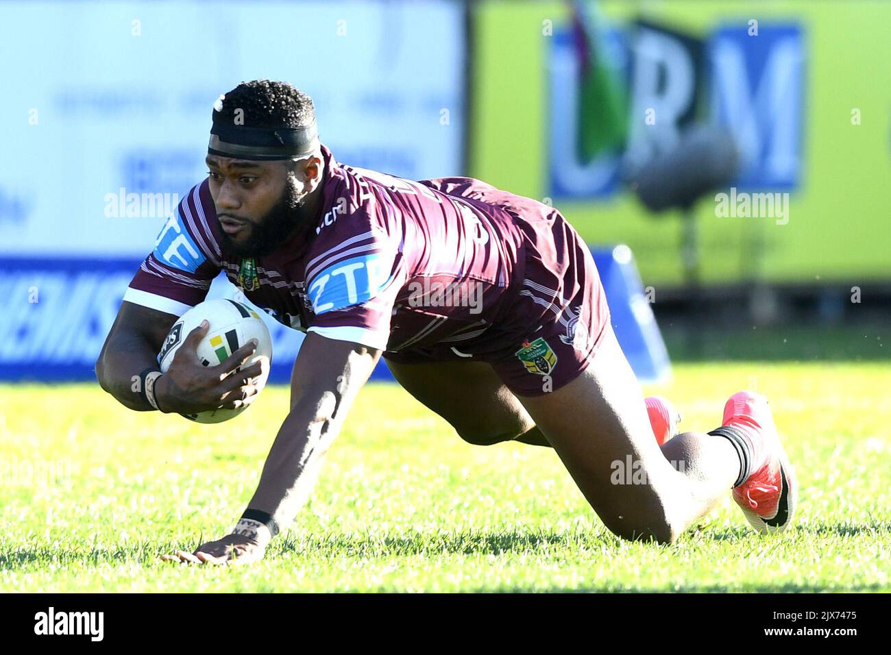 Akuila Uate of the Sea Eagles scores a try during the round 19 NRL ...