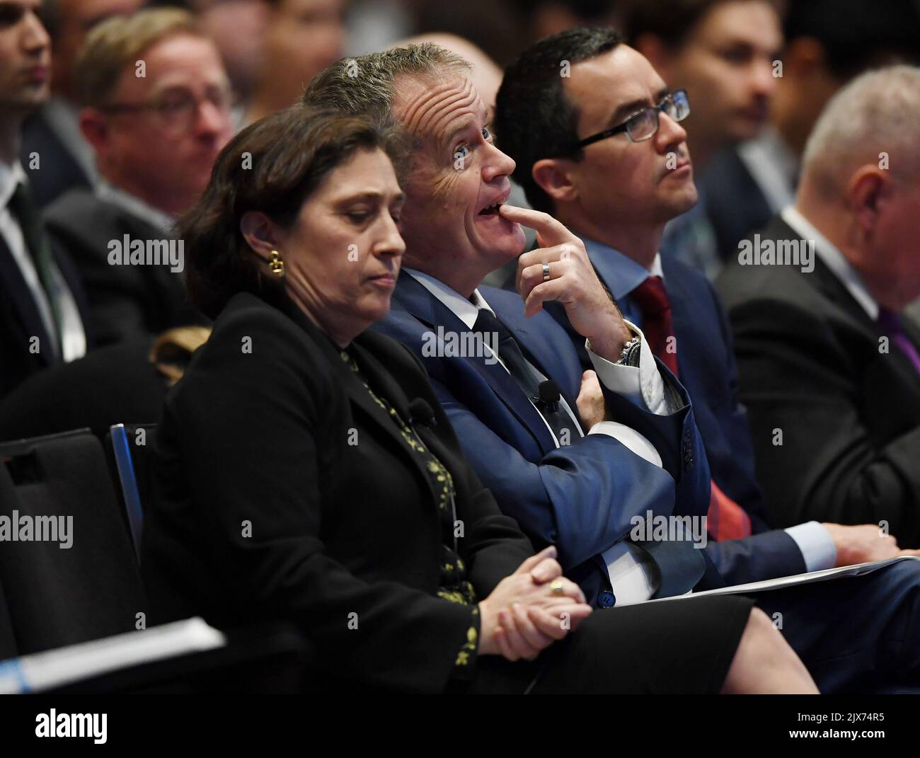 Leader of the Opposition Bill Shorten (centre) gestures as he sits in ...