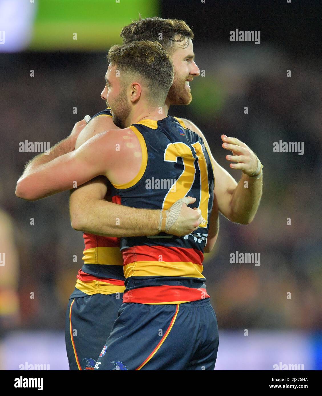 Rory Atkins (right) and Andy Otten of the Crows react after winning the ...