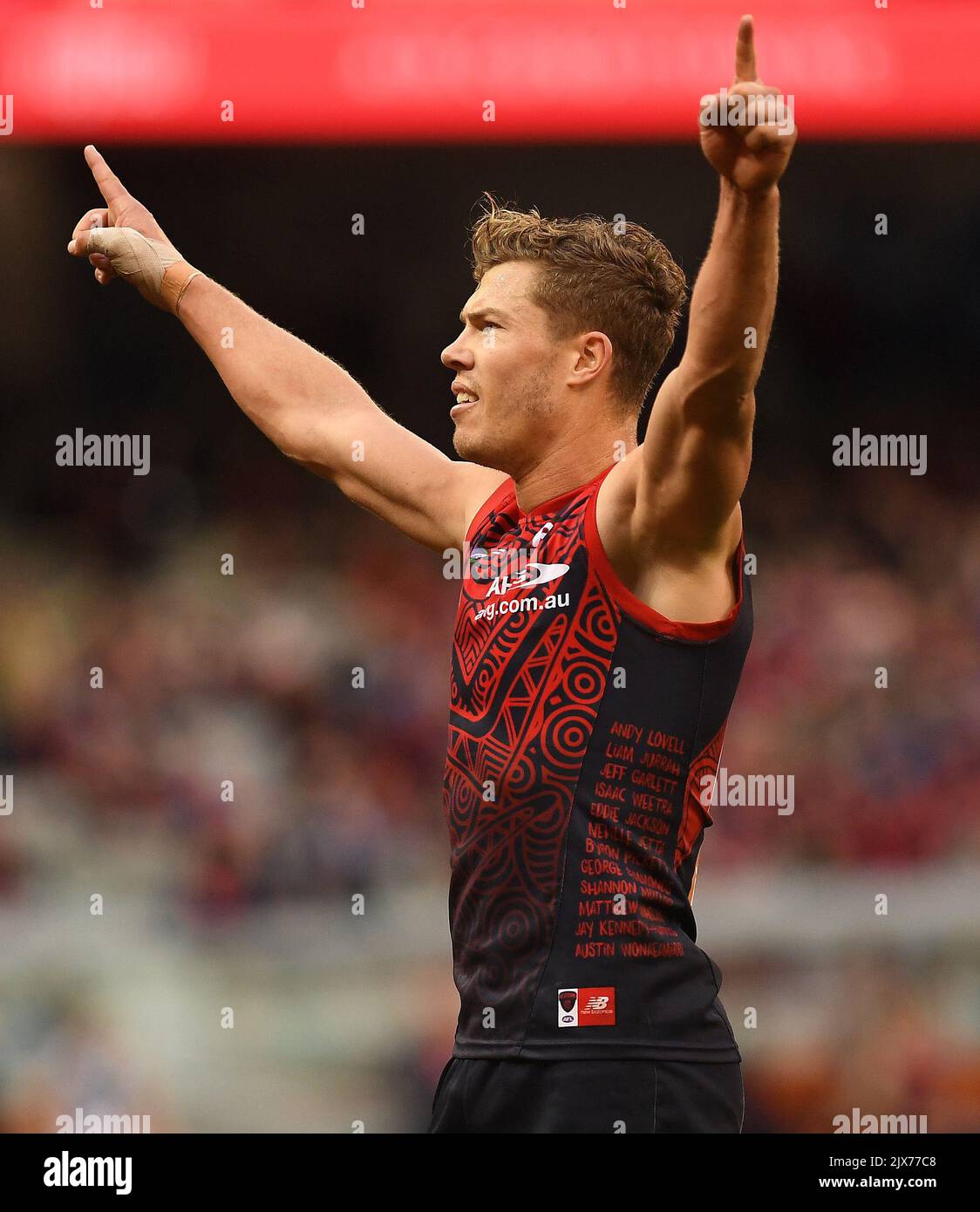 Jake Melksham of the Demons reacts after kicking a goal during the ...