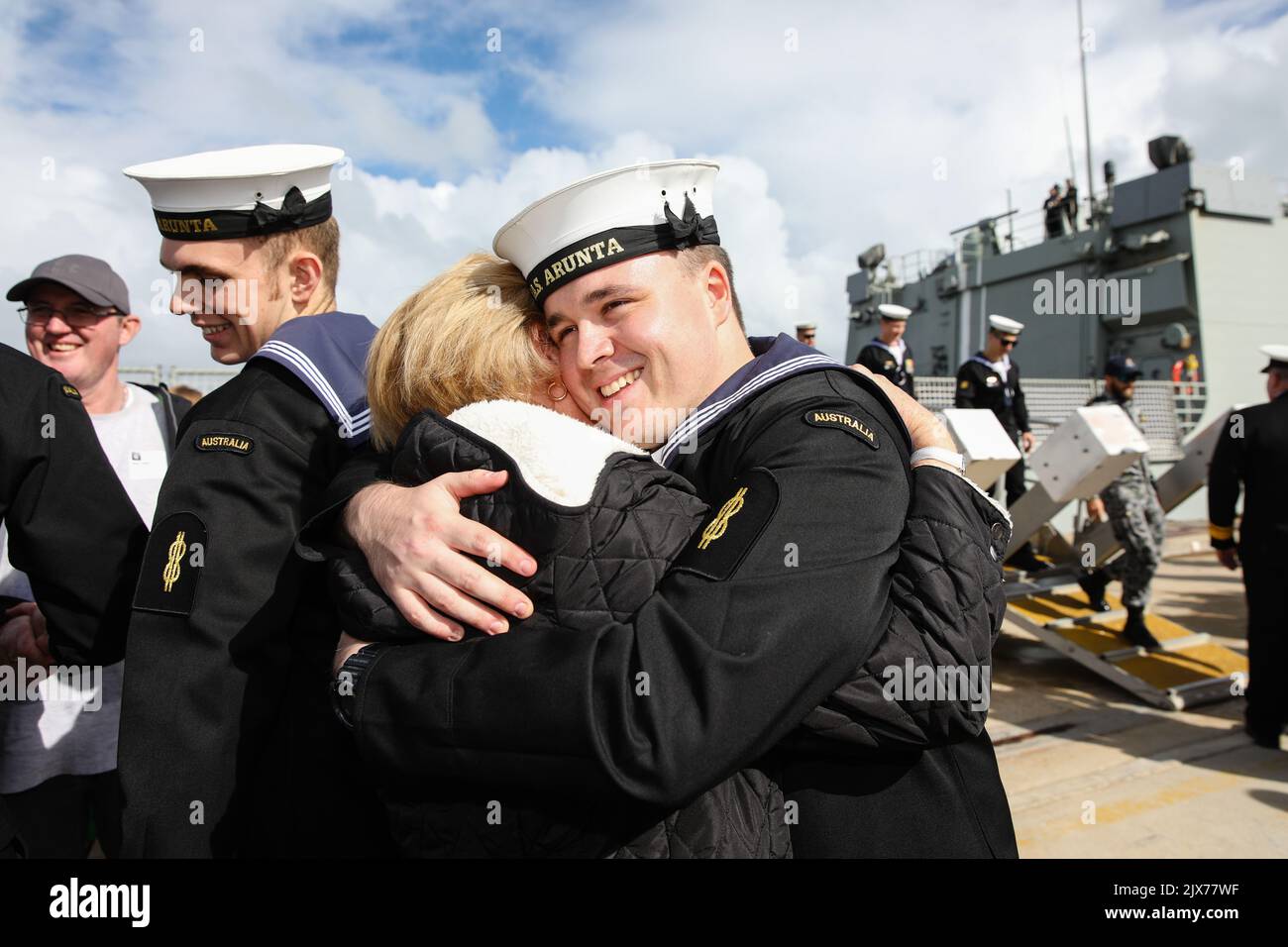 Crew of HMAS Arunta are greeted by family and friends after arriving in ...