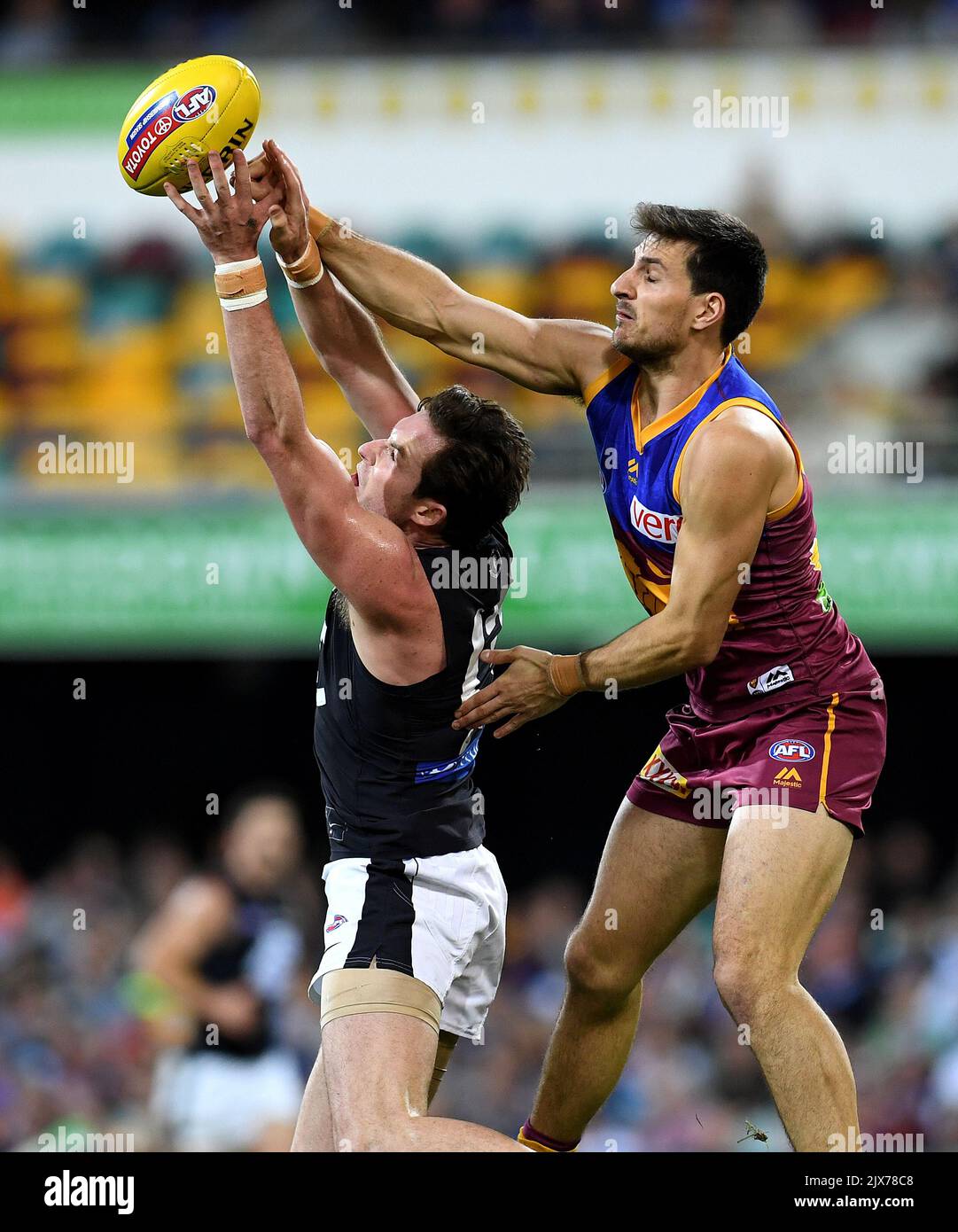Sam Mayes of the Lions (right) and Jed Lamb of Carlton during the Round ...