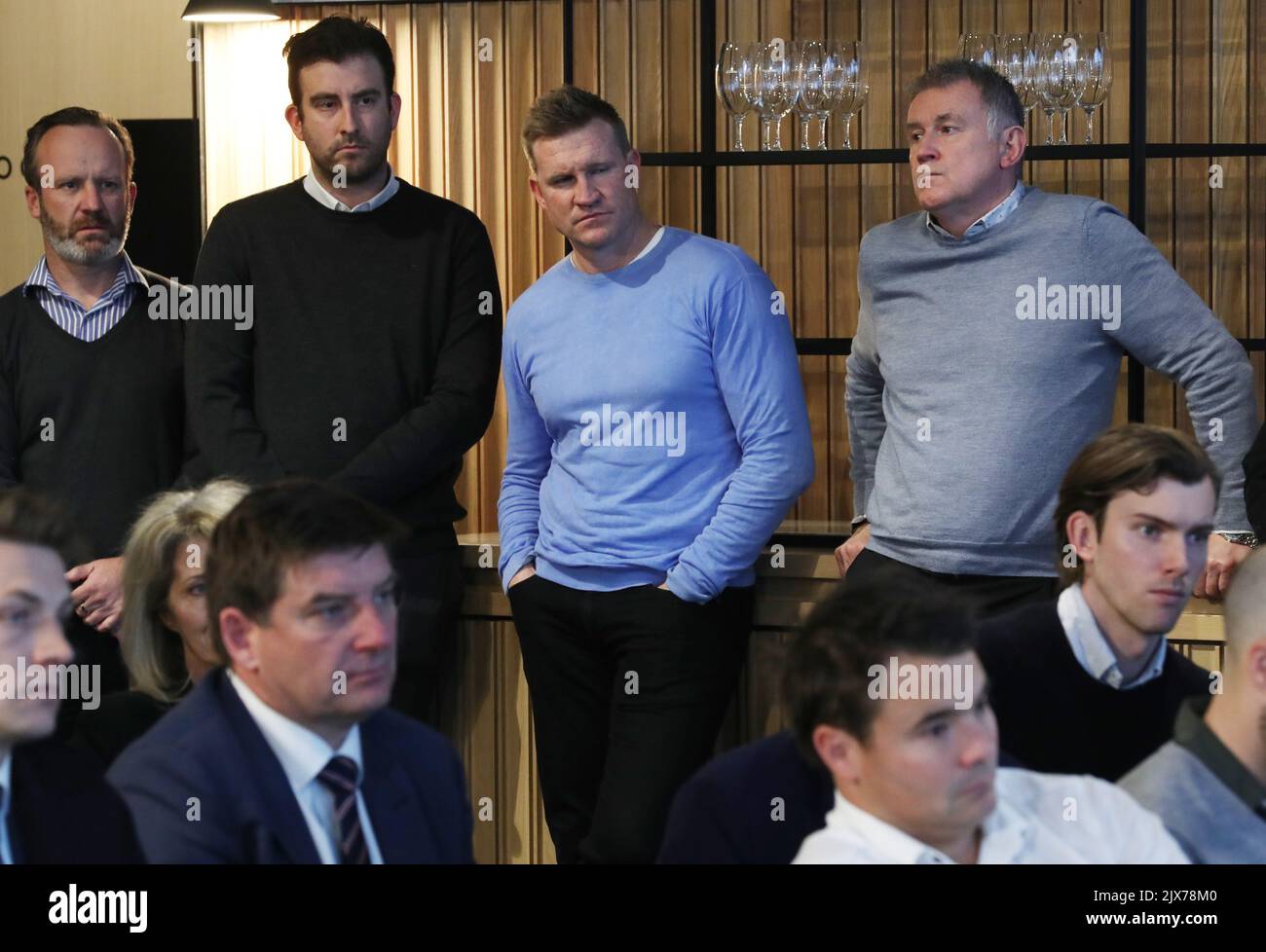 Collingwood coach Nathan Buckley (centre) watches Collingwood AFL club ...