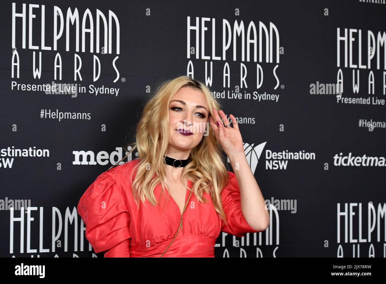 Kate Miller-Heidke poses for a photograph as she arrives for the 17th Annual Helpmann Awards in ...