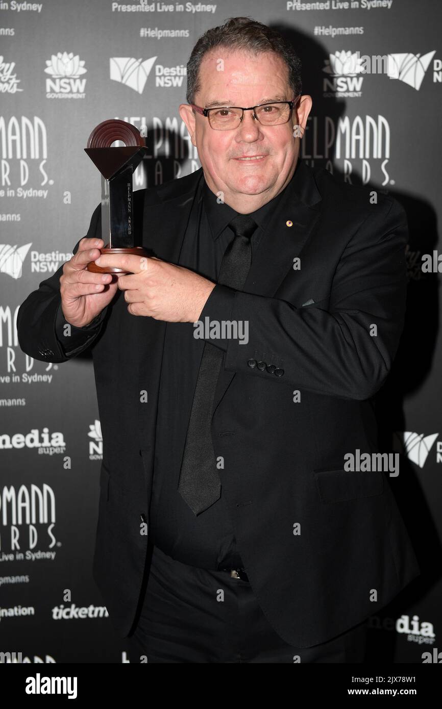 John Frost poses for a photograph with the award for Best Musical at ...