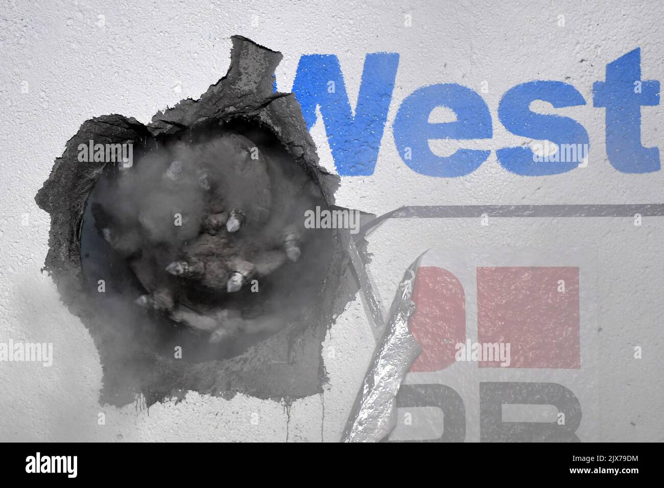 A road header breaks through rock during the first M4 WestConnex tunnel ...