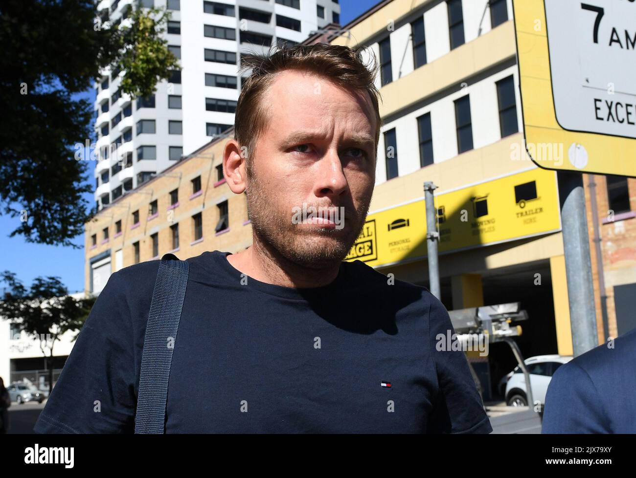 Daniel Allan Baker leaves the Magistrates Court in Brisbane, Thursday ...