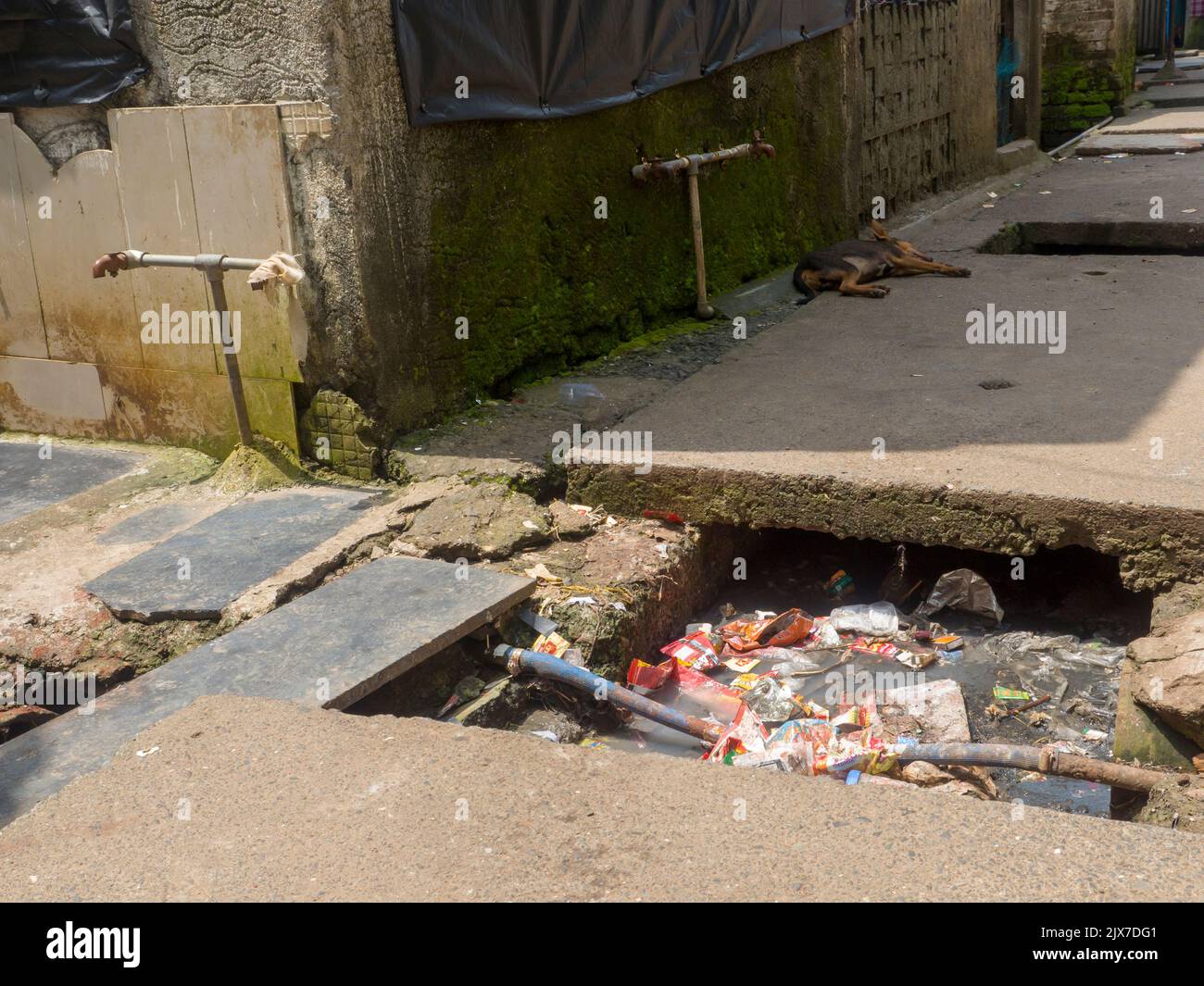 Drain gutter in the road hi-res stock photography and images - Alamy