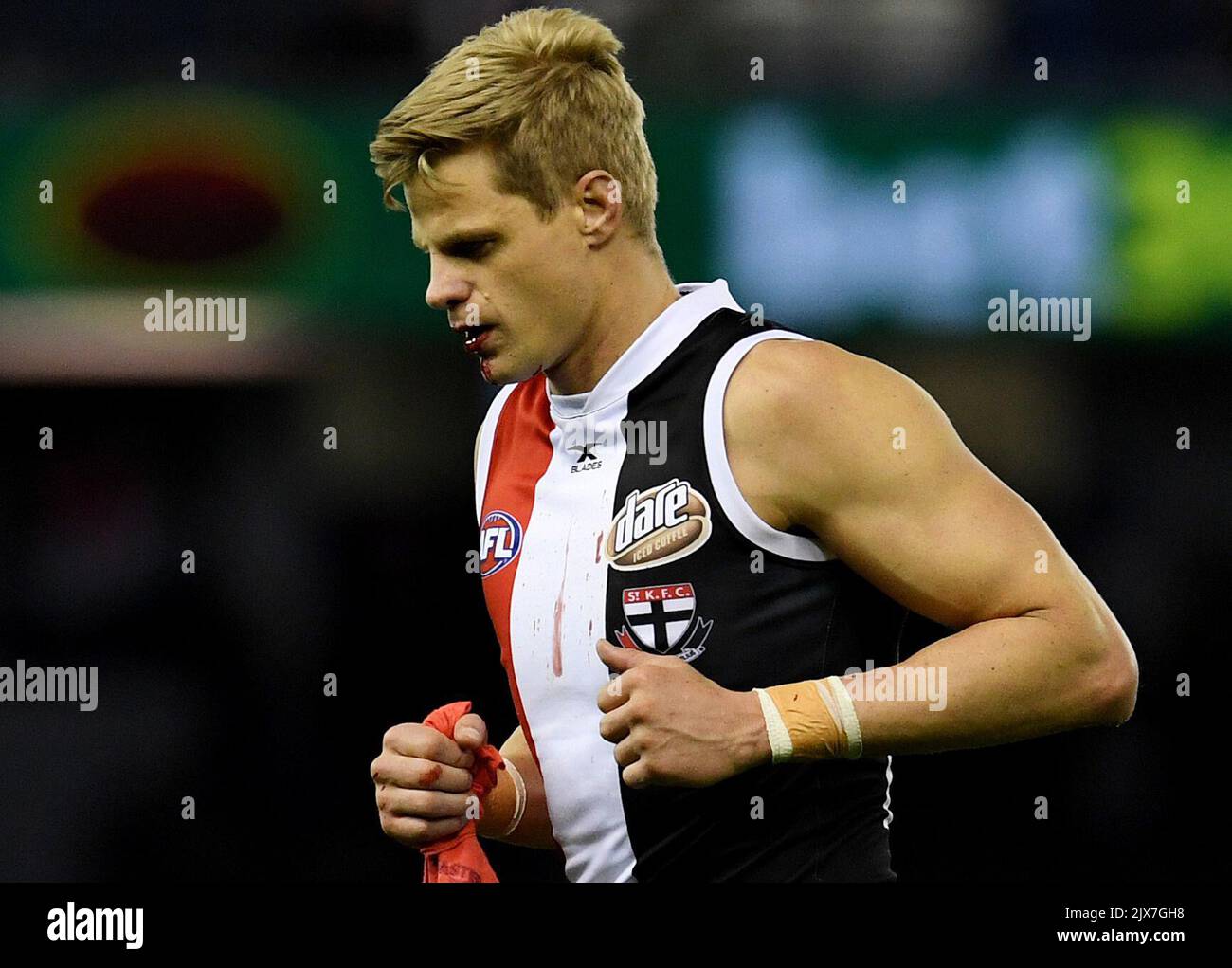 Nick Riewoldt of the Saints comes off with the blood rule after being ...