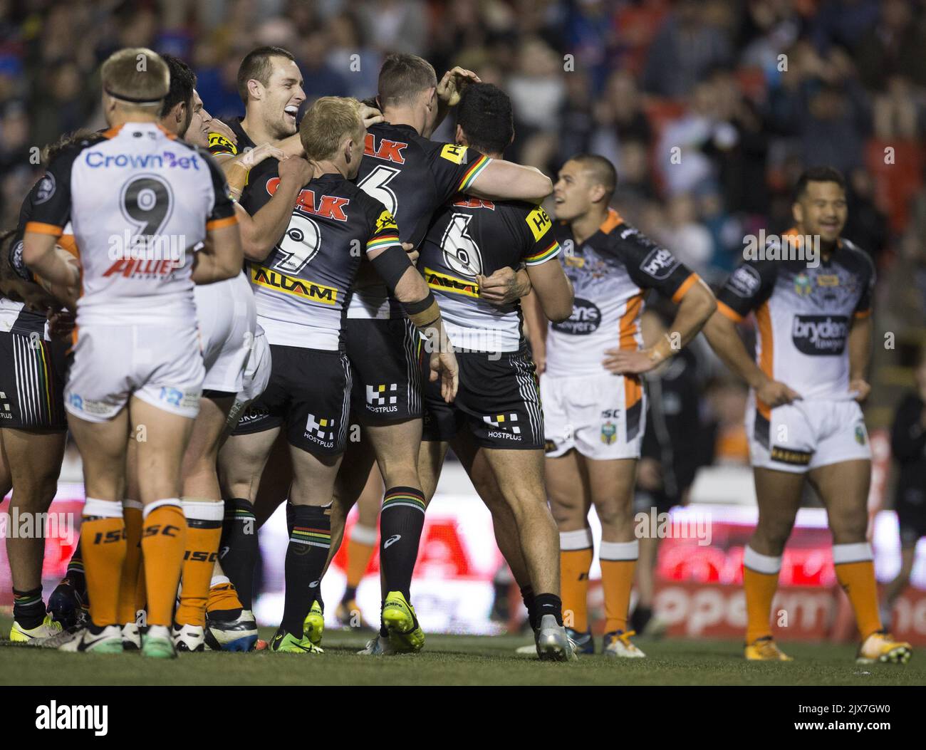Penrith Panthers celebrate a try by Tyrone May of the Panthers during ...