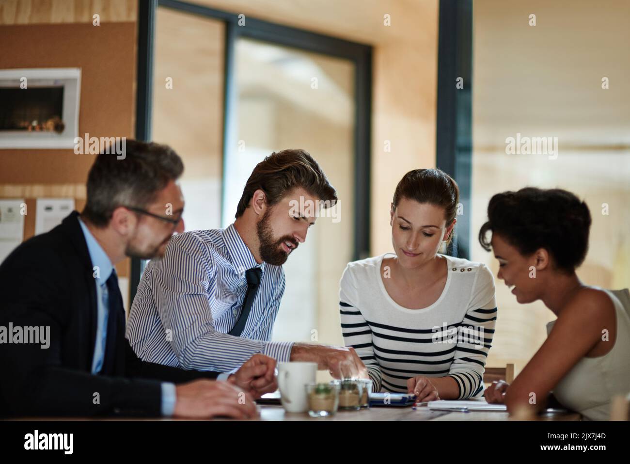 Bringing business ideas to life. a group of colleagues working together ...