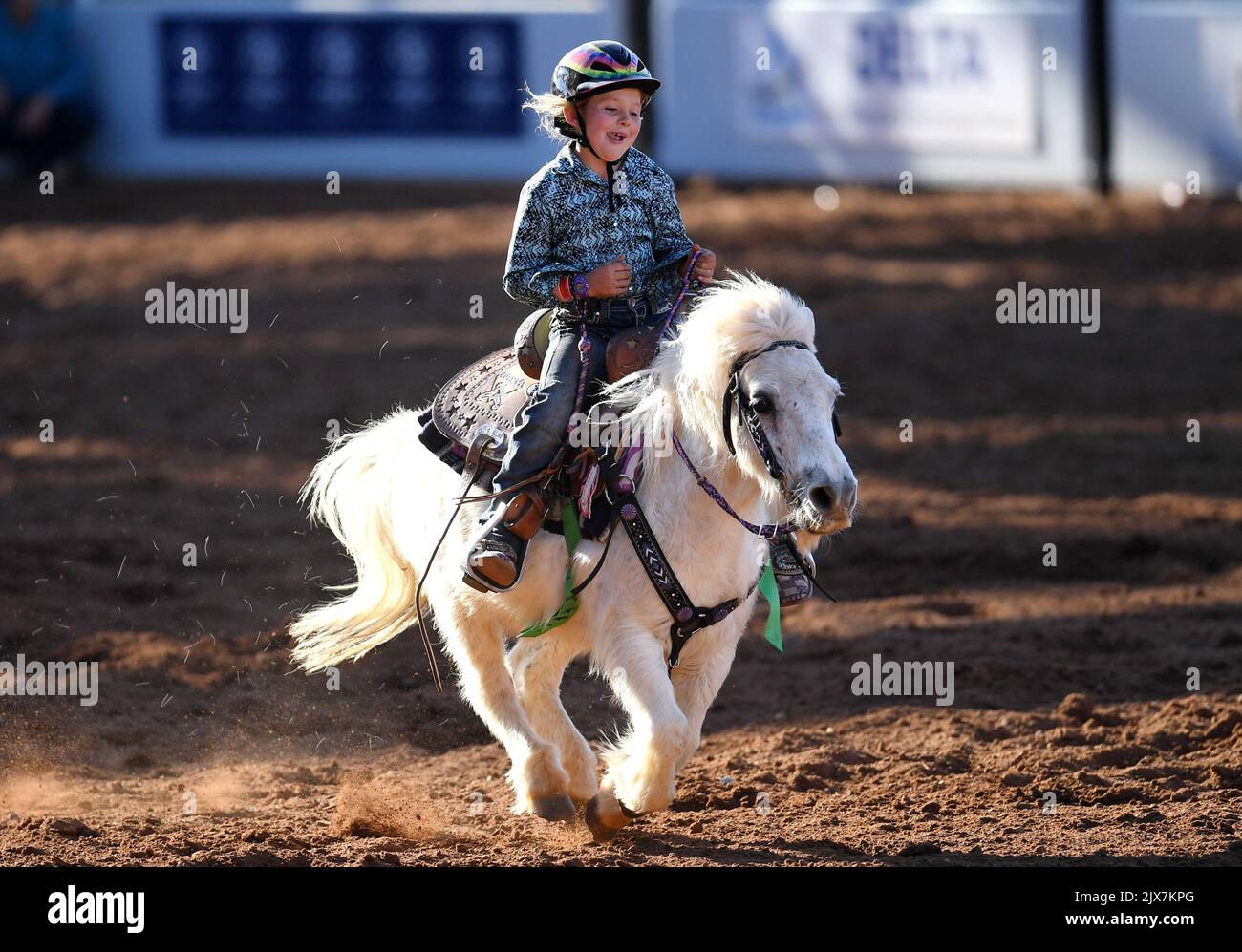 Seven-year-old Dekota Caban, rides her horse Biscuit as she competes in ...