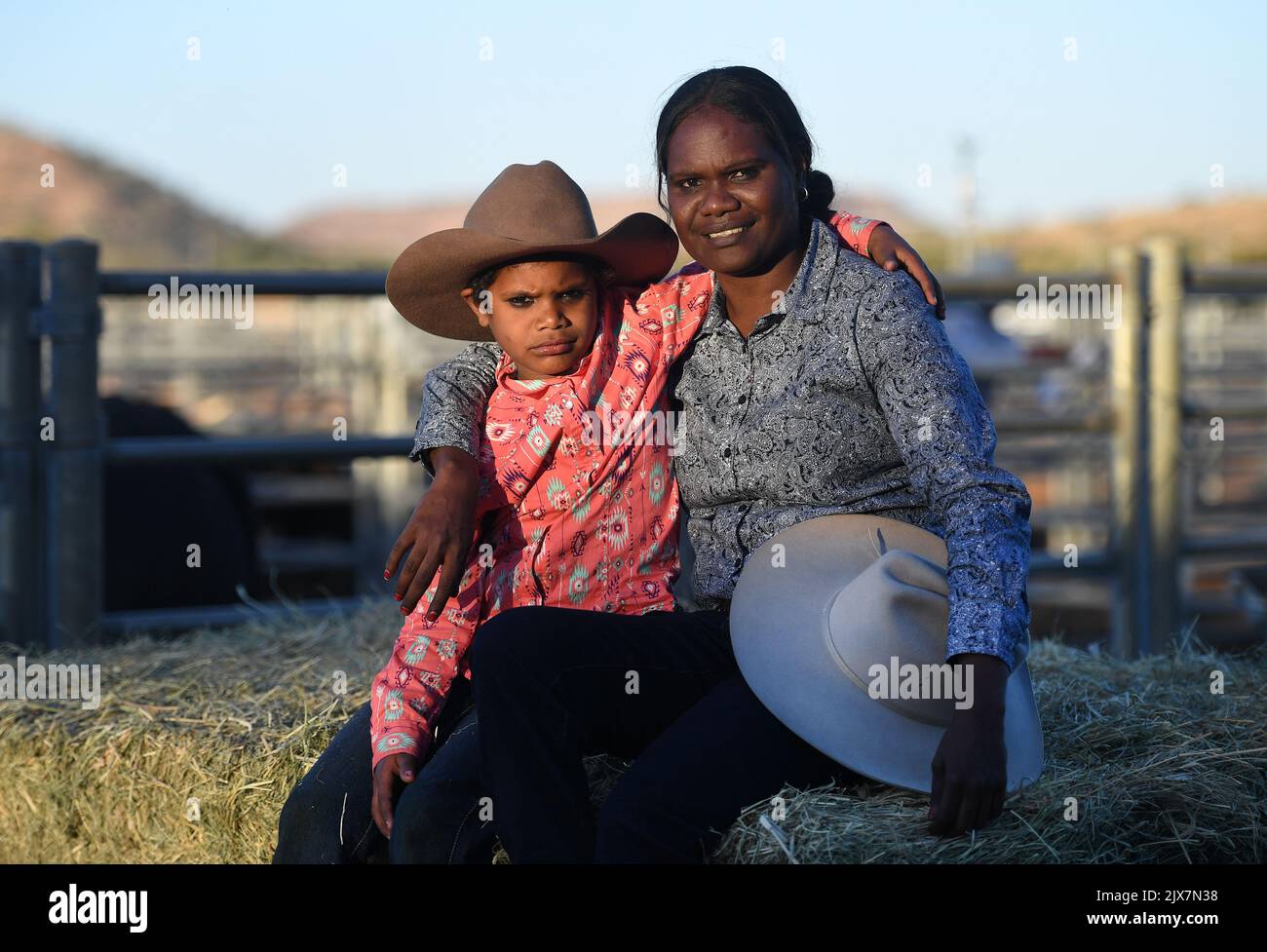 Kayleigh (right) and Lateicka Johnny pose for photos at the Mount Isa ...