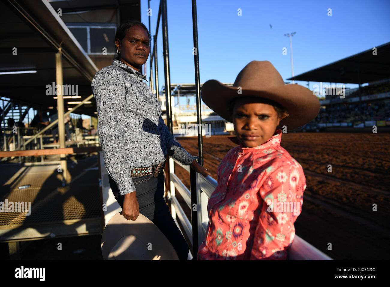 Kayleigh (left) and Lateicka Johnny pose for photos at the Mount Isa ...