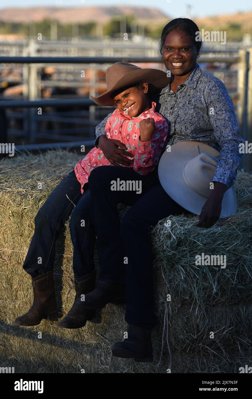 Kayleigh (right) and Lateicka Johnny pose for photos at the Mount Isa ...