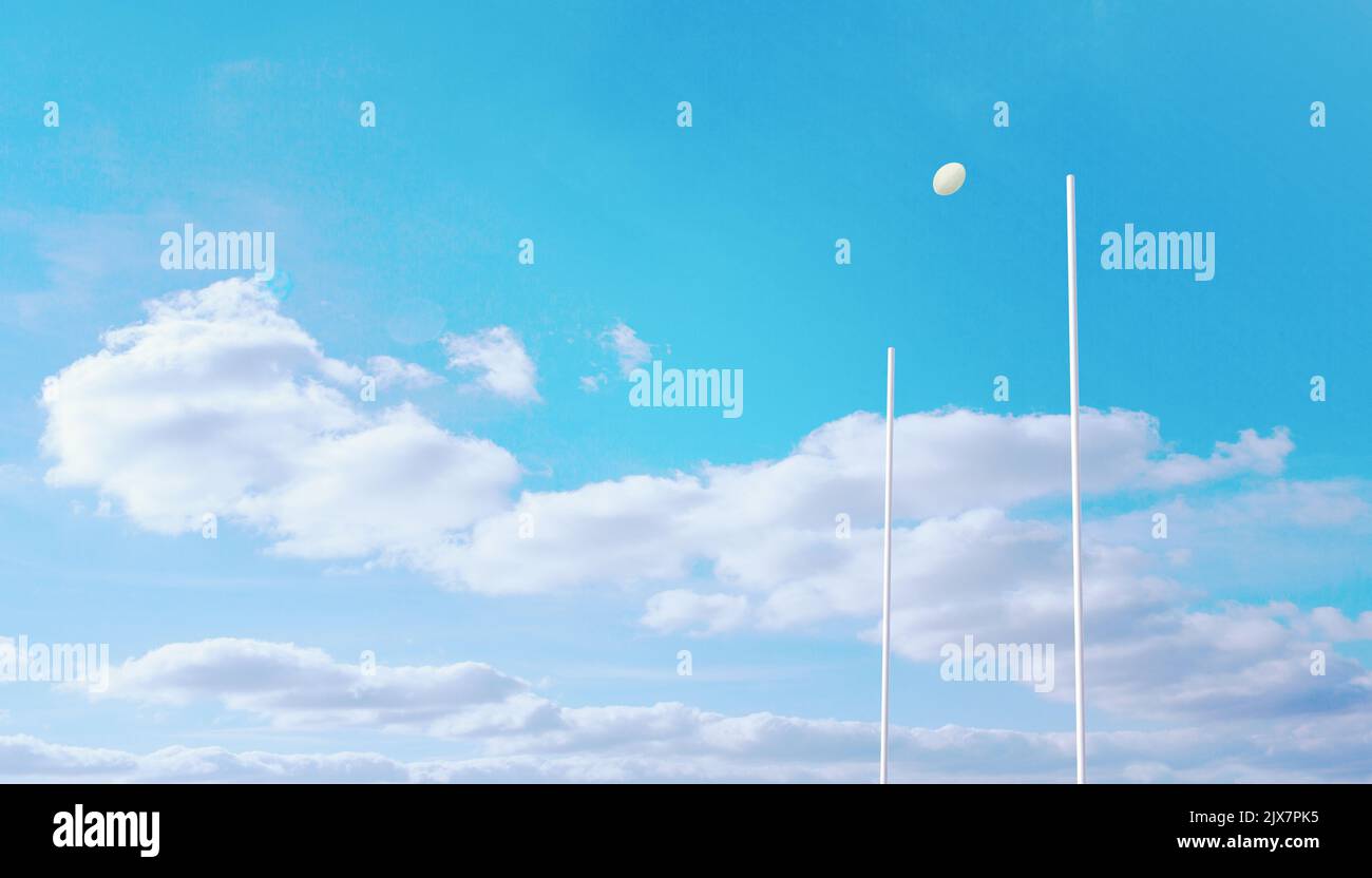 Rugby ball flying between posts Stock Photo - Alamy